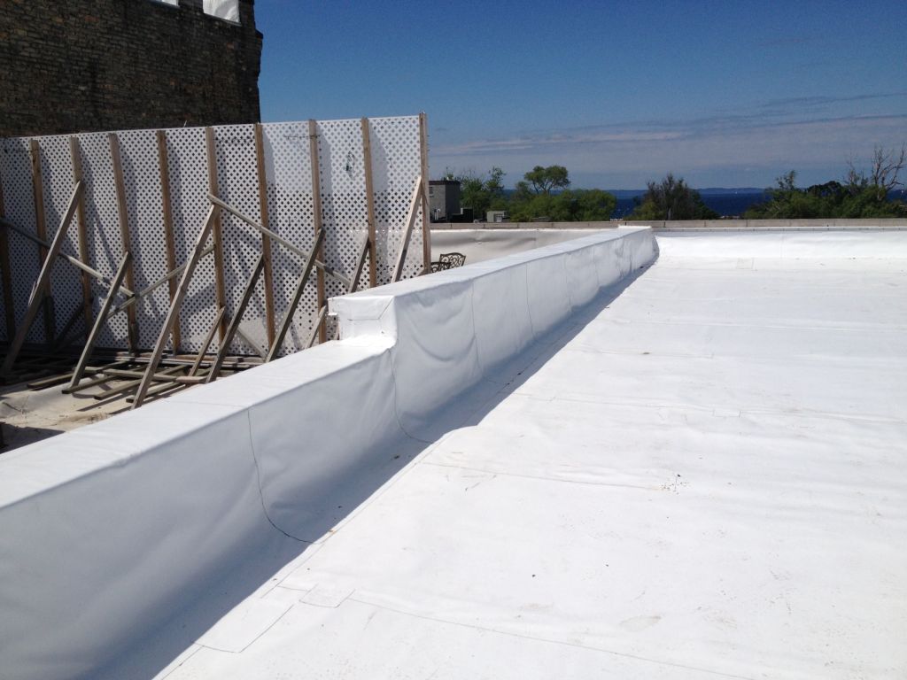 Traverse City Arcade Building PVC Roof – Bloxsom Roofing & Siding
